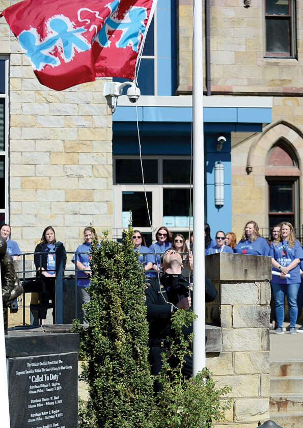 Reaching out: Ceremony highlights efforts to prevent child abuse | News ...